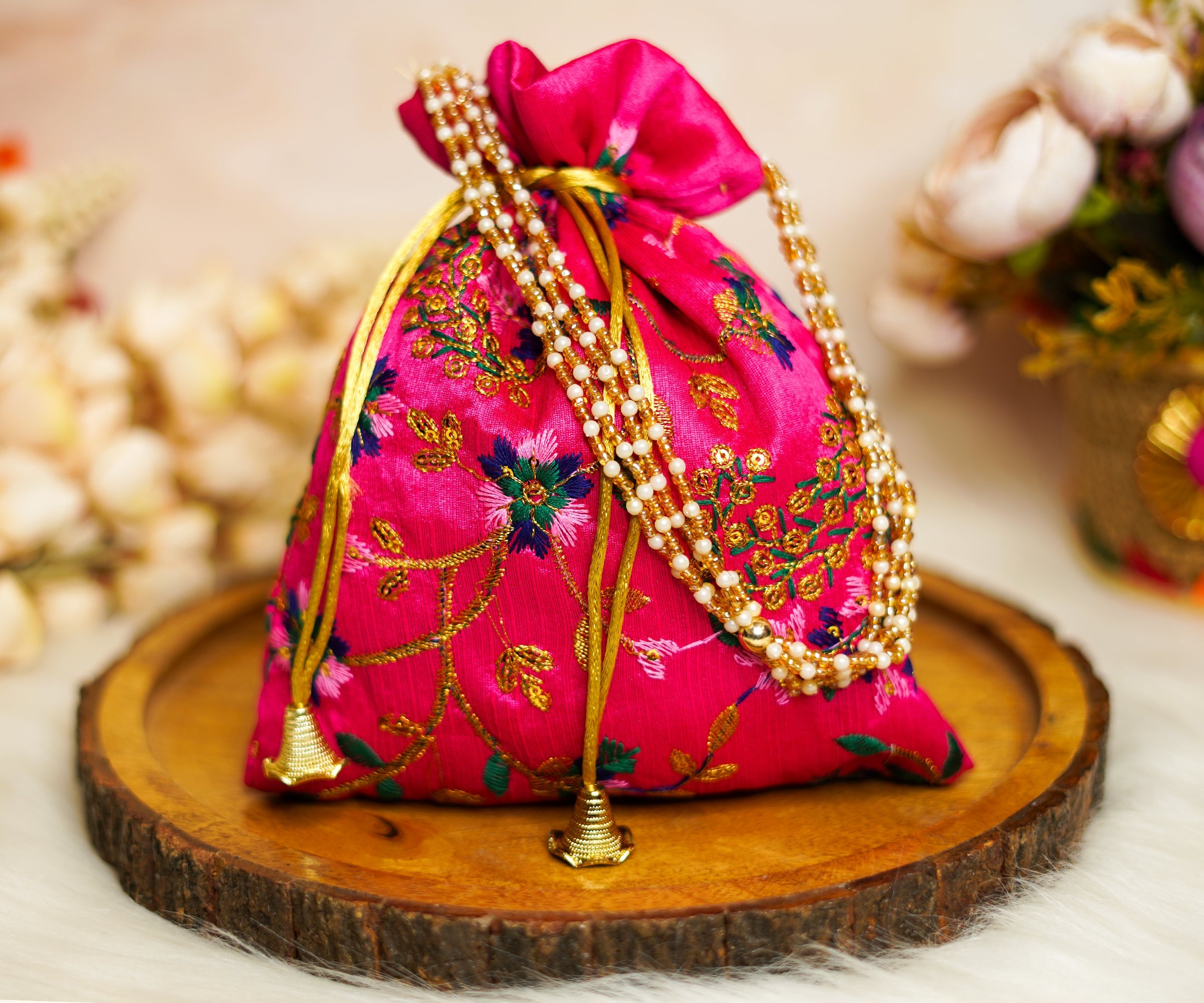 "Elegant Hot Pink Embroidered Potli Bag with Pearl Handle" – Devastram